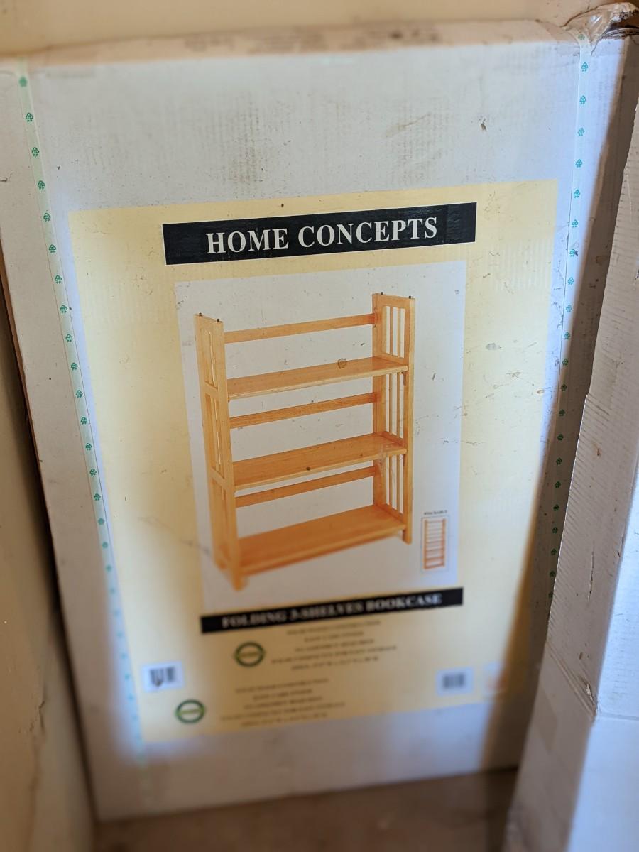 NIB Fold Up Home Concept Bookcase | EstateSales.org
