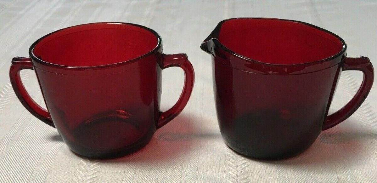 Ruby Red Glass Decorative sugar bowl & creamer set | EstateSales.org