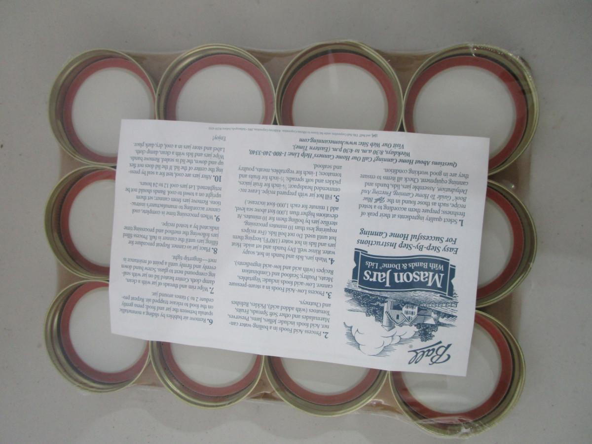 #54 1 dozen canning rings and lids | EstateSales.org