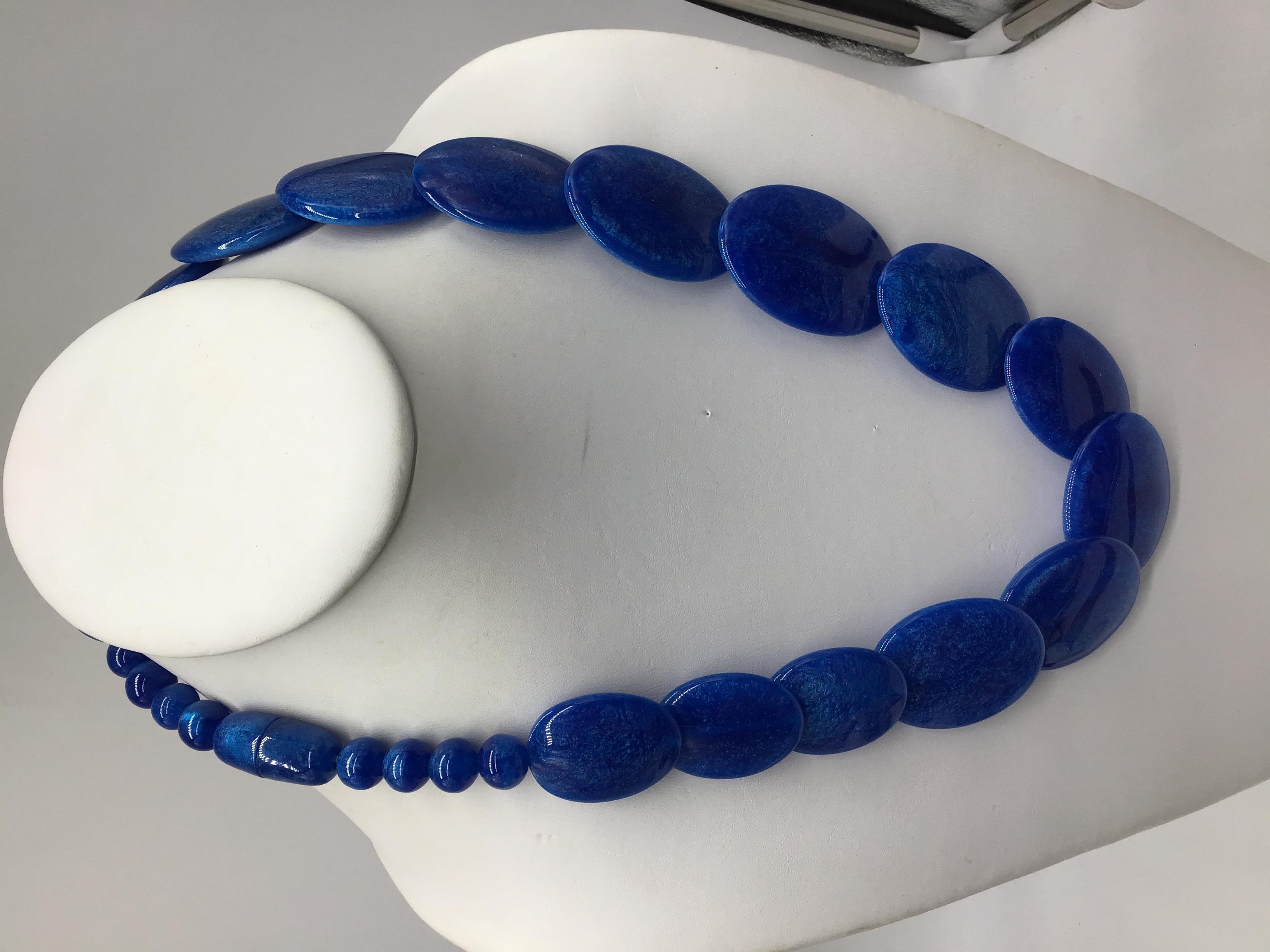 Metallic Blue plastic Type Necklace | EstateSales.org