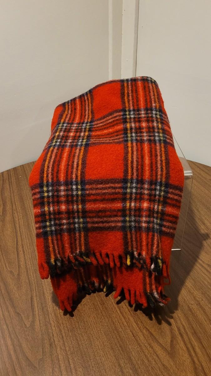 Lot 22: Vintage Fairbo Red, Black & Yellow Wool Blanket | EstateSales.org
