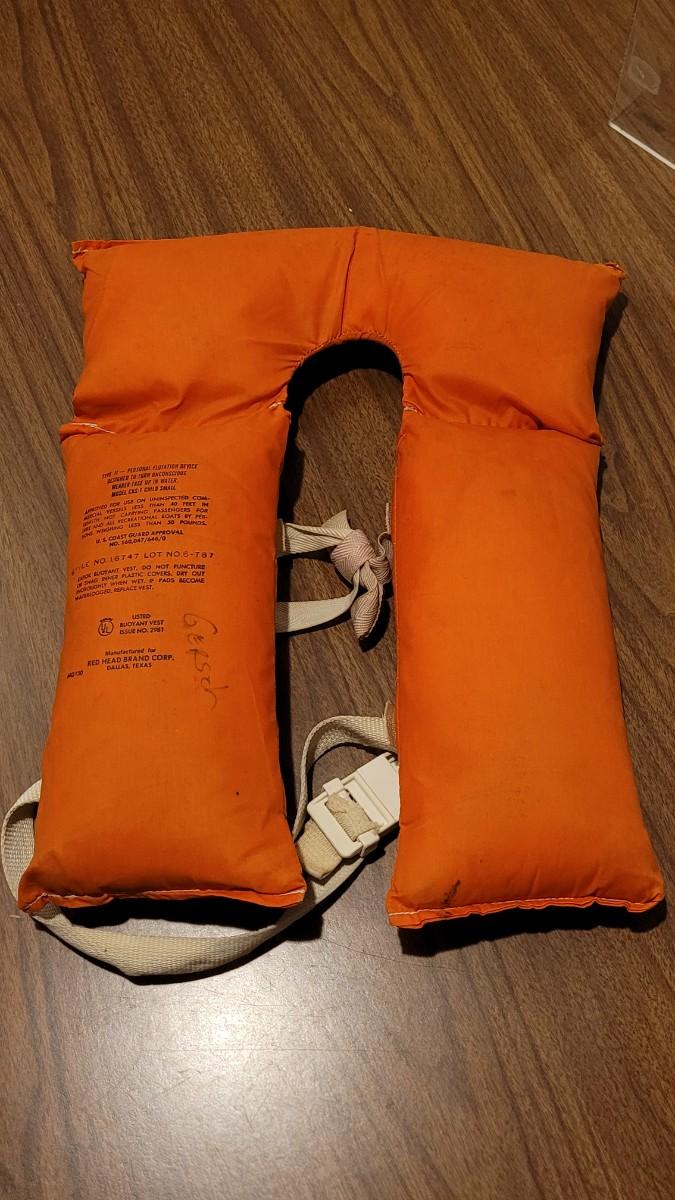 Lot 71: Vintage Child's Orange Life Vest and Blue Boat Cushion Life ...