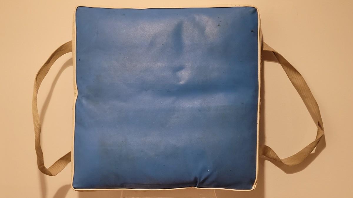 Lot 71: Vintage Child's Orange Life Vest and Blue Boat Cushion Life ...