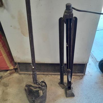 VINTAGE METAL POST HOLE DIGGER, AND JACK | EstateSales.org