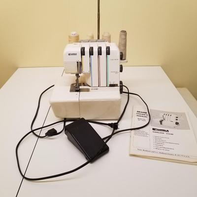 Sears Kenmore Overlock 2/3/4D Sewing Machine (SR-JS) | EstateSales.org