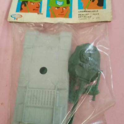 LOT 132 TWO VINTAGE PAYTON TOY MILITARY SETS | EstateSales.org