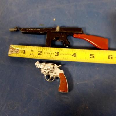 LOT 142 TWO MARX MINIATURE CAP GUNS | EstateSales.org