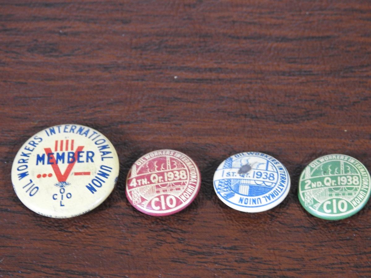 Collection of 4 American oil workers union pins from 1938 | EstateSales.org