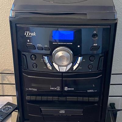 LOT C70: iTrak Stereo & Speakers | EstateSales.org