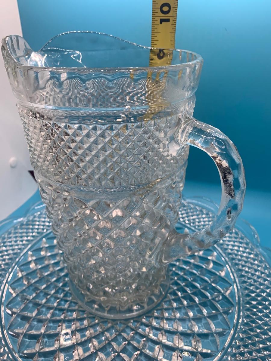 Glass server platter & heavy glass pitcher | EstateSales.org