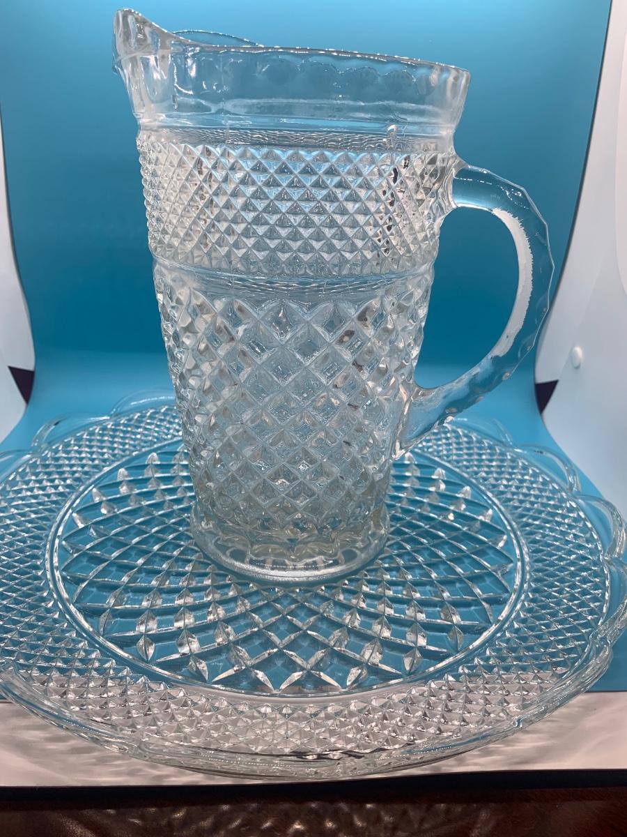 Glass server platter & heavy glass pitcher | EstateSales.org