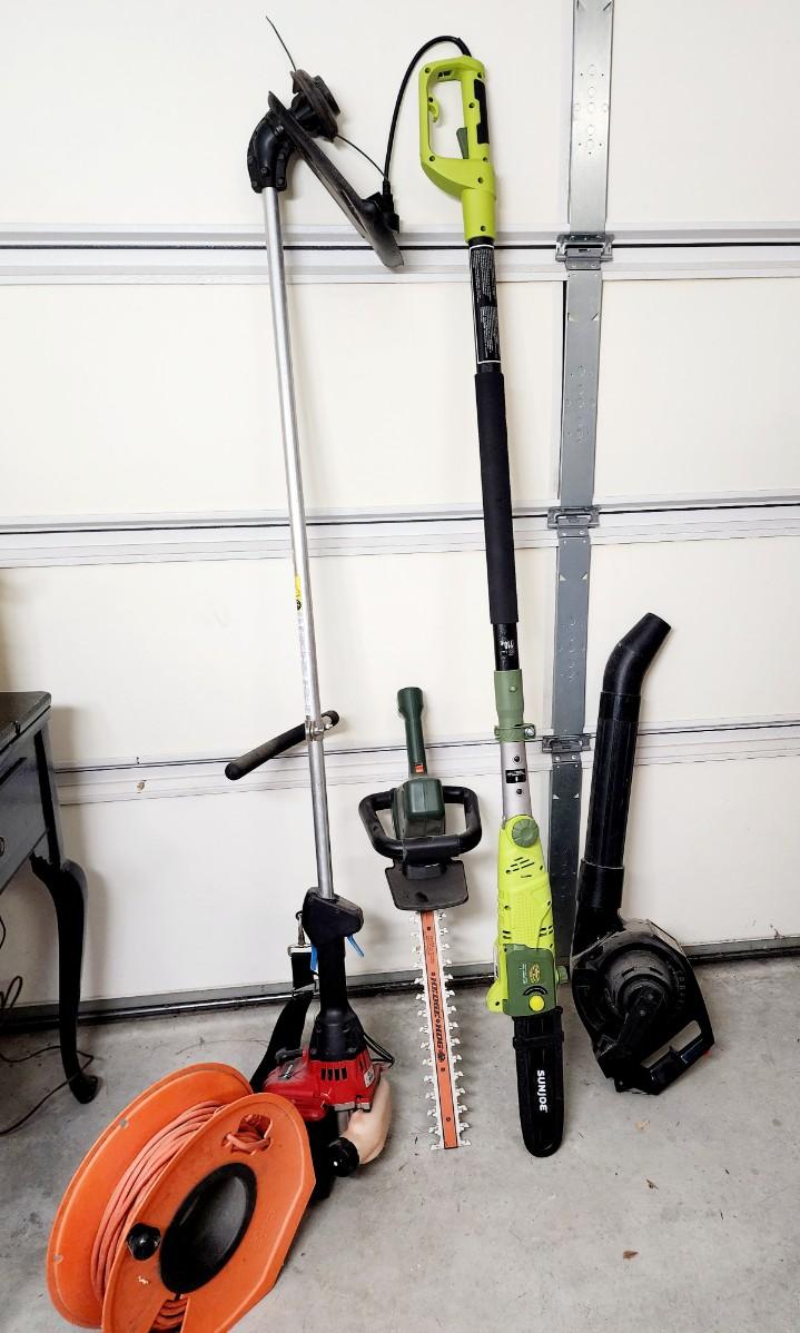 Lot of 4 garden power tools: chainsaw, blower, hedge trimmer, weed ...