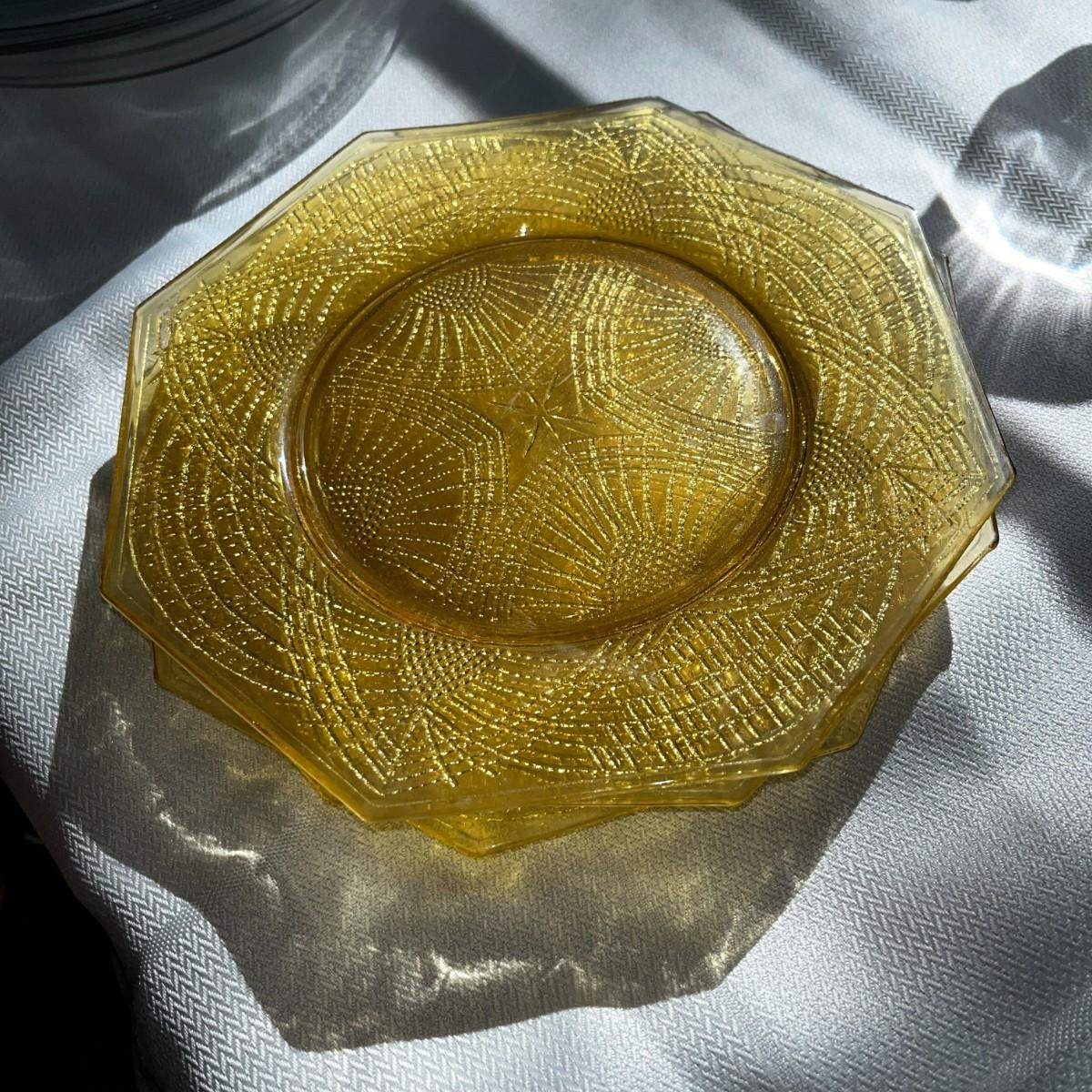 Four L E Smith Yellow Glass Plates | EstateSales.org
