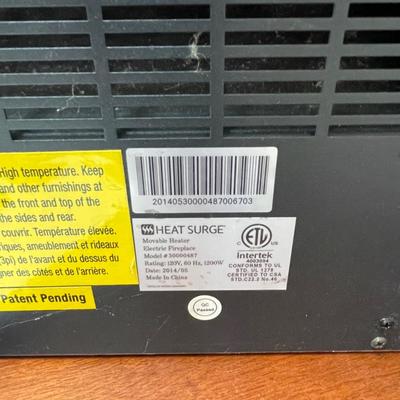 Two Heat Surge Electric Fireplace Heaters (SR-RG) | EstateSales.org