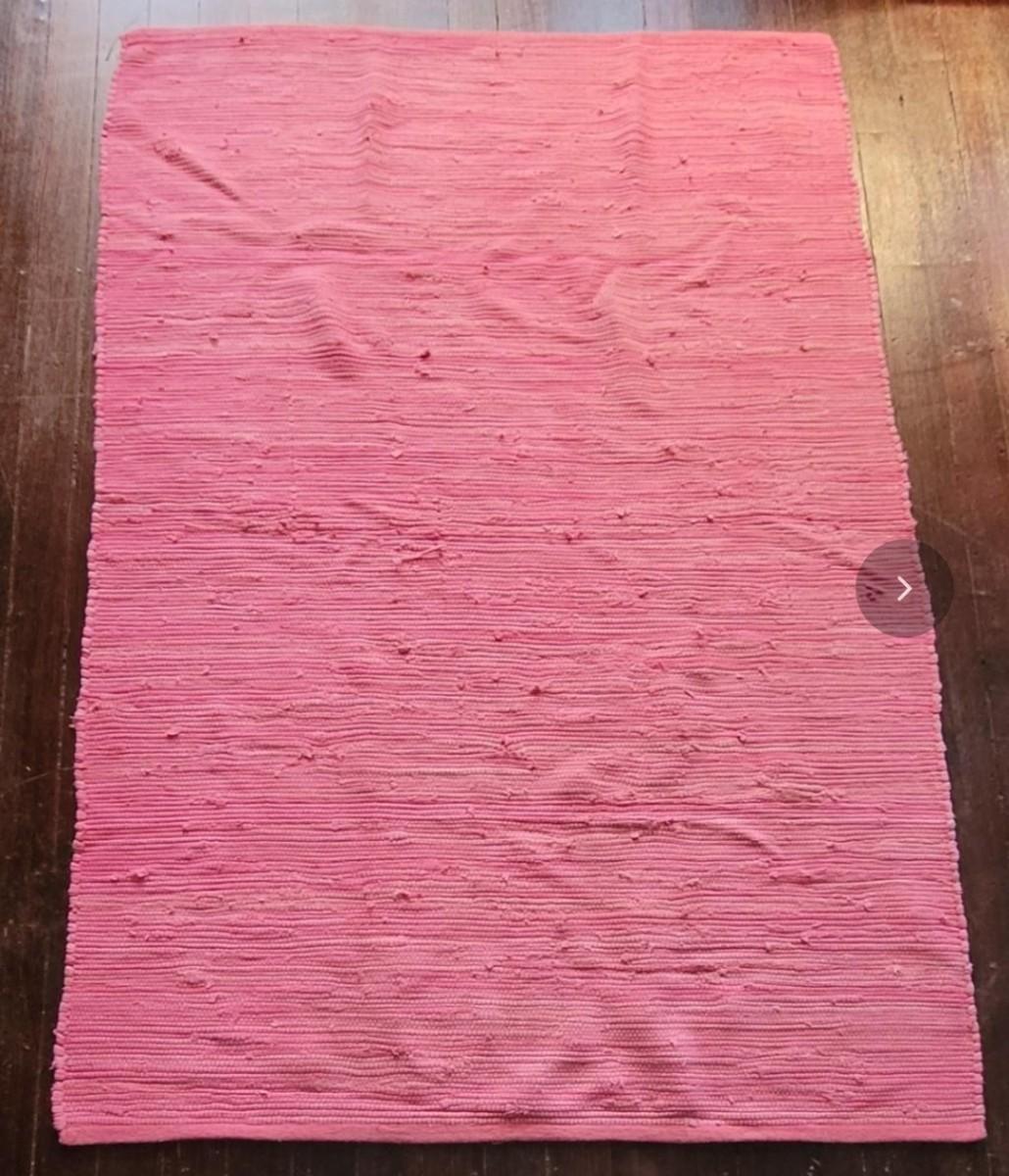 131: Pink Rag Area Rug | EstateSales.org