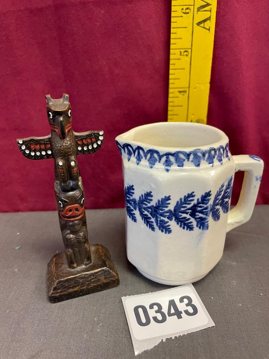Collectible small pitcher/totem pole | EstateSales.org