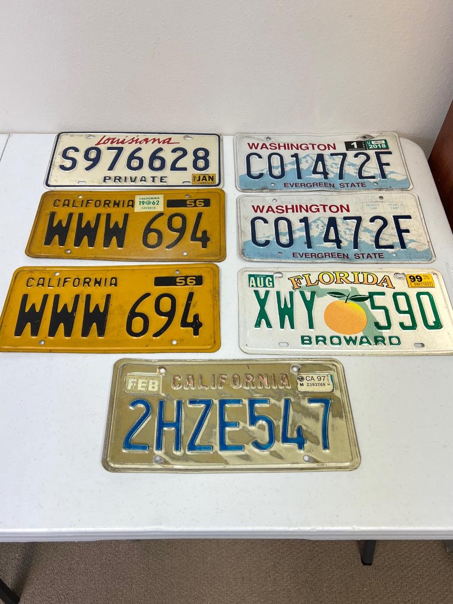 Seven (7) Assorted License Plates | EstateSales.org