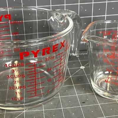 2 Pyrex Measuring Cups | EstateSales.org