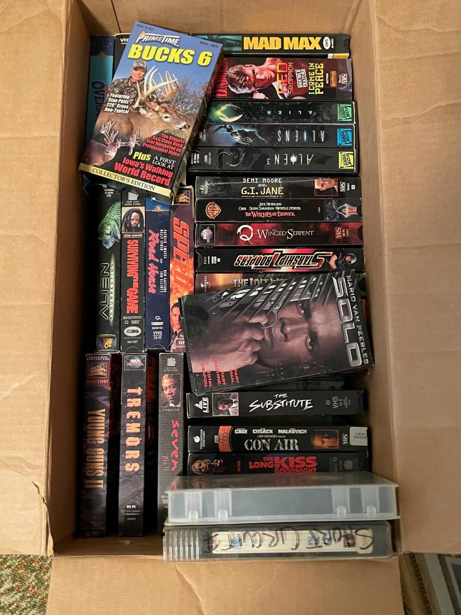 Full box of vintage VHS tapes | EstateSales.org