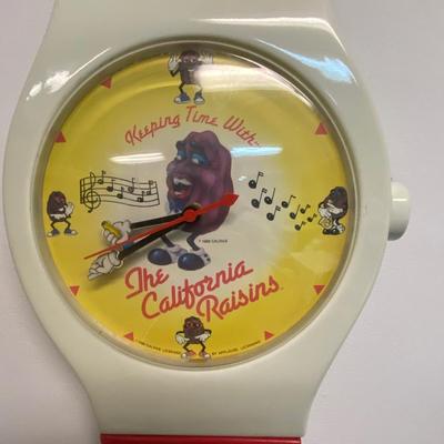 LOT 99: California Raisins Watch Wall Clock 54"L | EstateSales.org