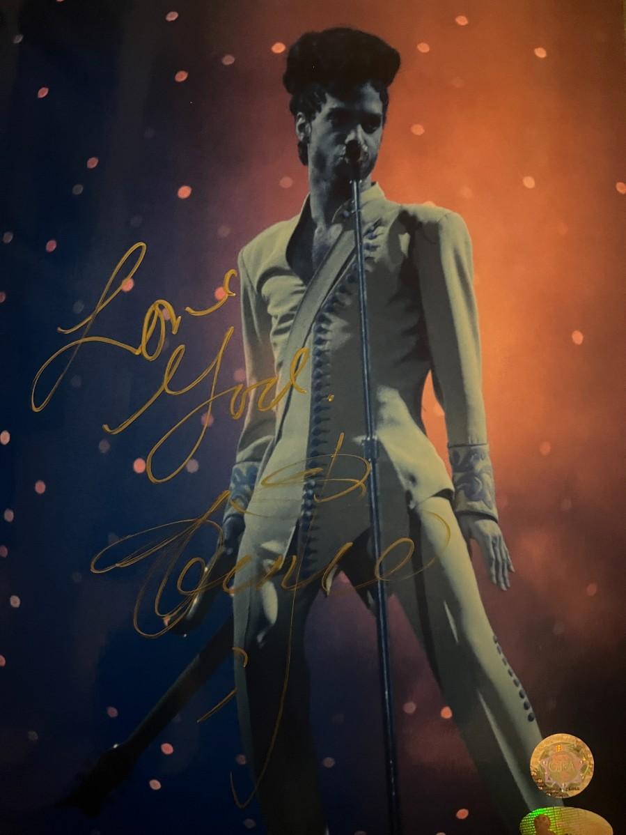 Prince signed photo. GFA authenticated | EstateSales.org