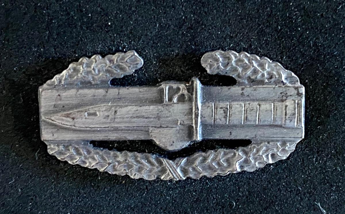 US ARMY COMBAT ACTION BADGE | EstateSales.org