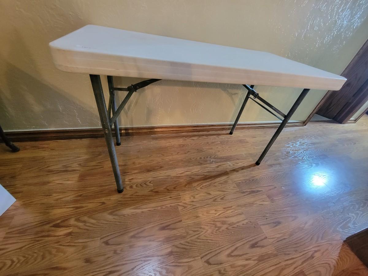 4 ft folding table | EstateSales.org