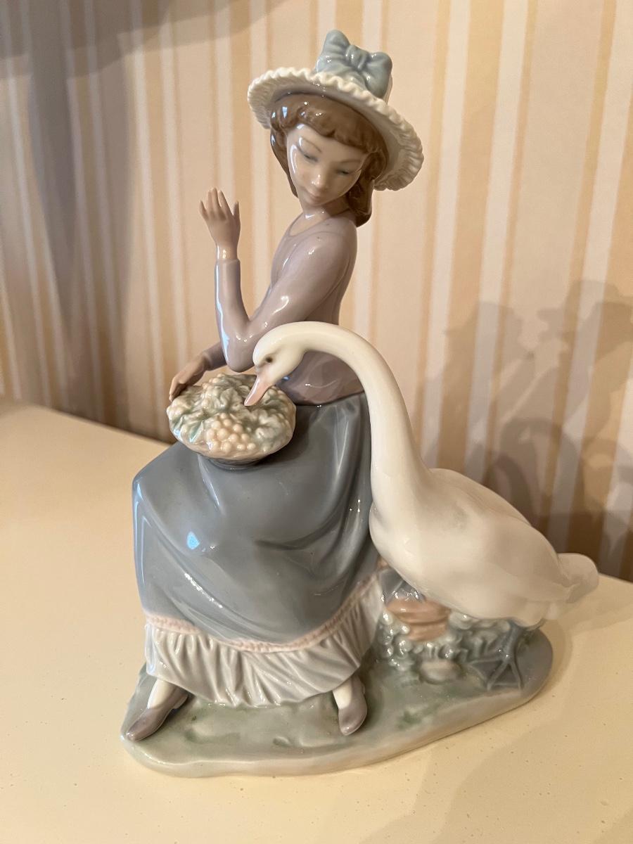 Lladro Girl Feeding Swan Figurine | EstateSales.org