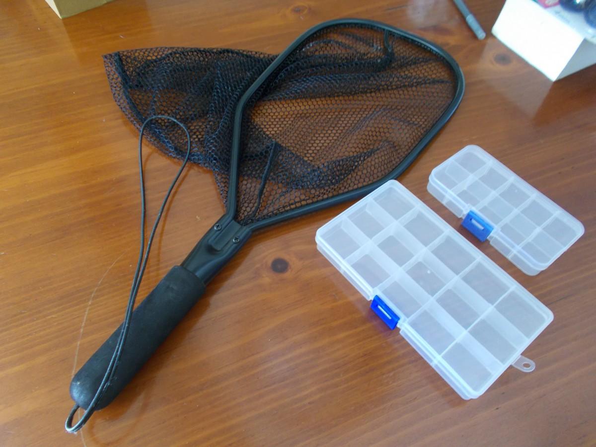 Fishing net and lure boxes | EstateSales.org