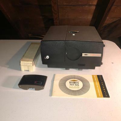 LOT95M: Rotomatic 707 AQ 2x2 Slide Projector | EstateSales.org