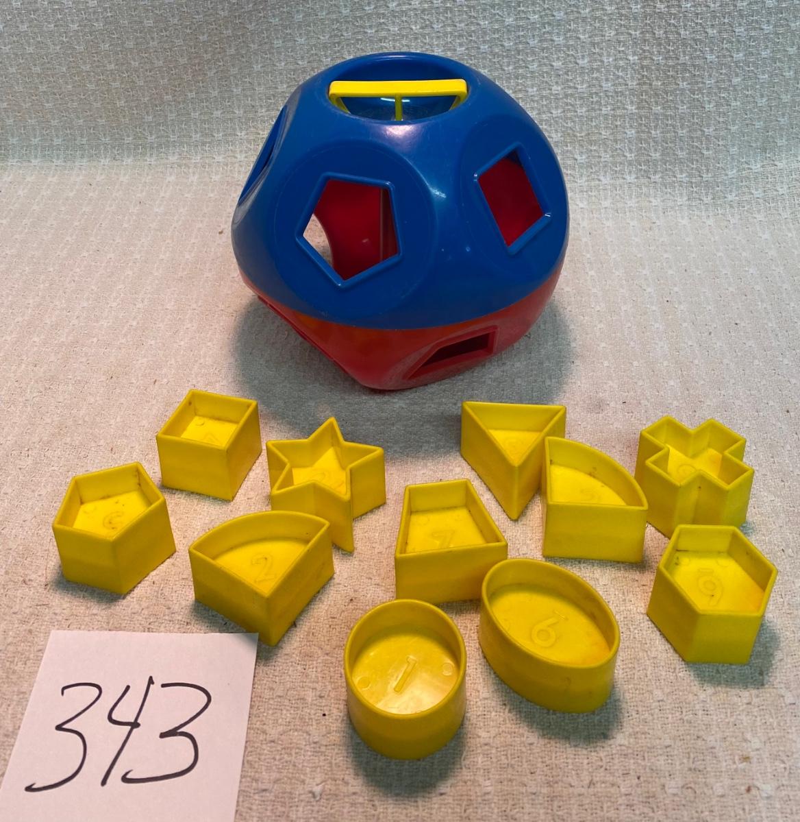 Vintage Tupperware Shape O Toy | EstateSales.org