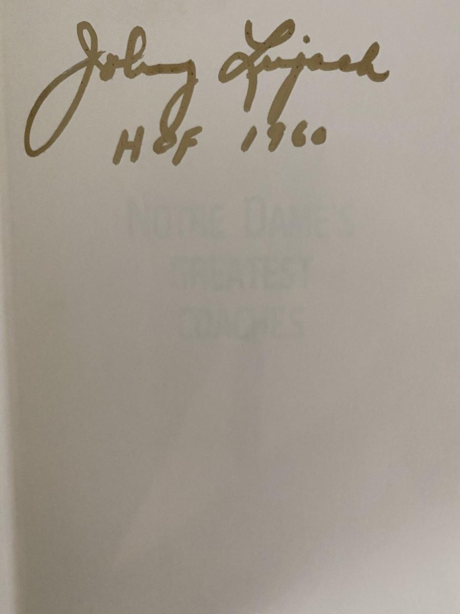 Johnny Lujack signed Notre Dame's Greatest Coaches book | EstateSales.org