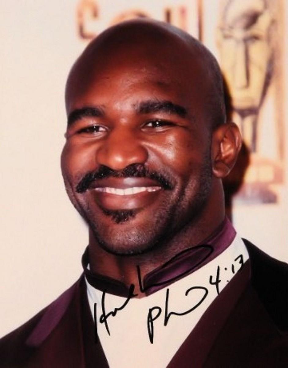 Evander Holyfield signed portrait photo | EstateSales.org