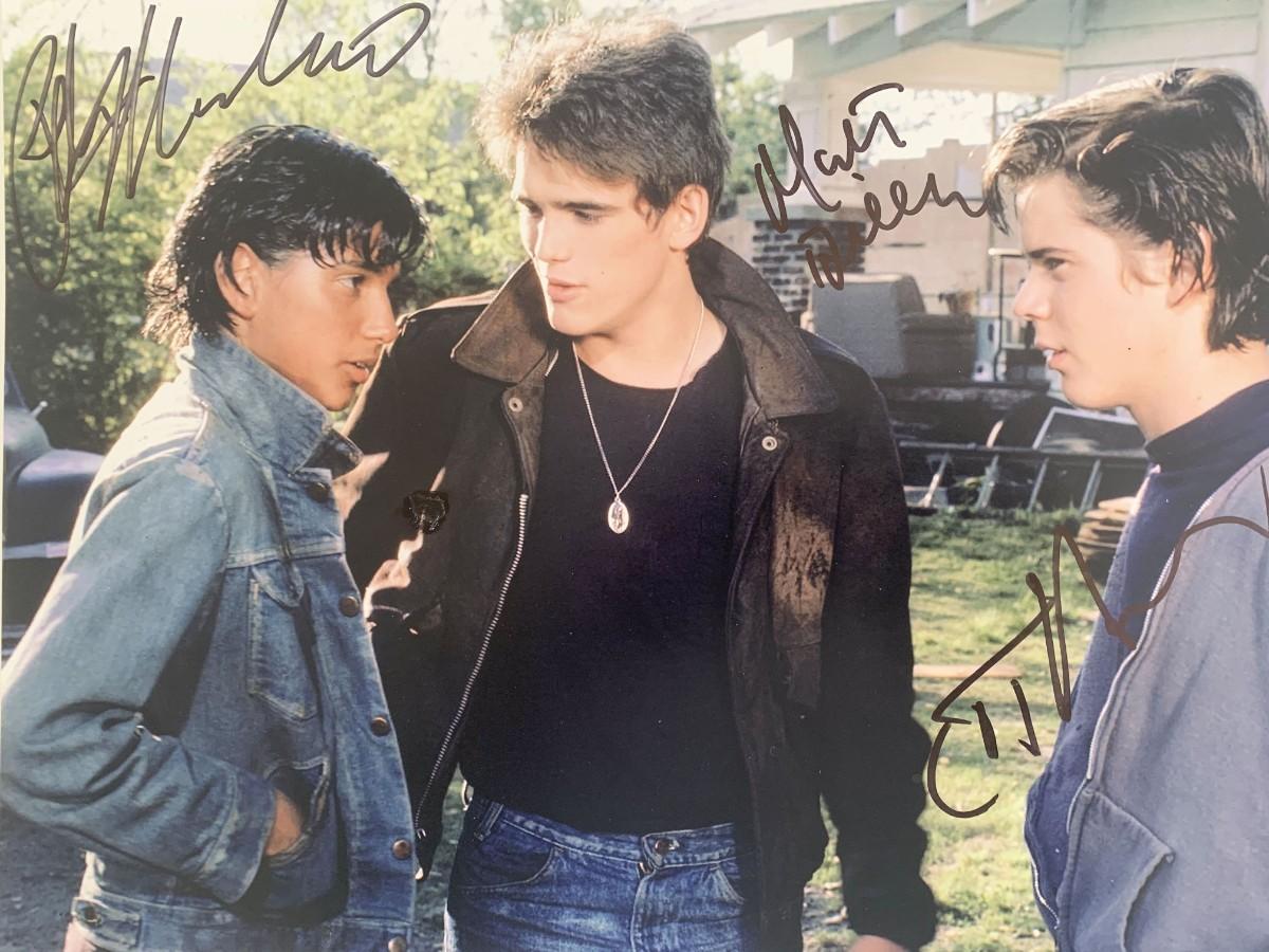 The Outsiders cast signed movie photo | EstateSales.org