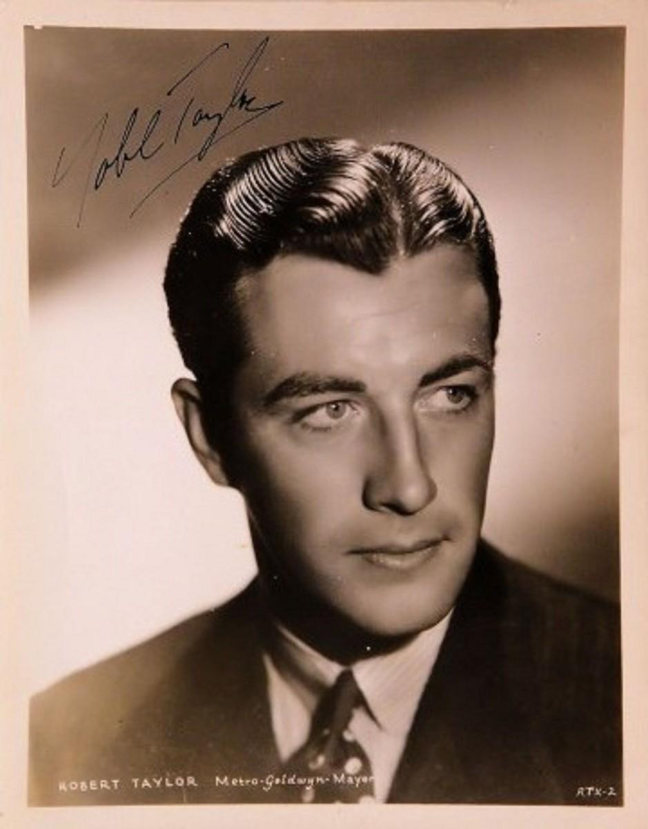 Robert Taylor signed portrait photo | EstateSales.org
