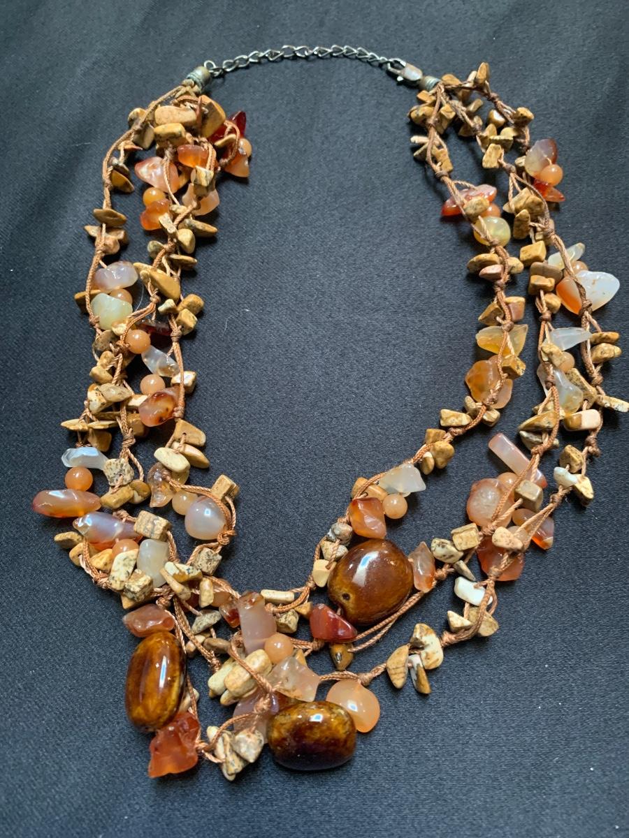 18” Amber Shell Necklace | EstateSales.org