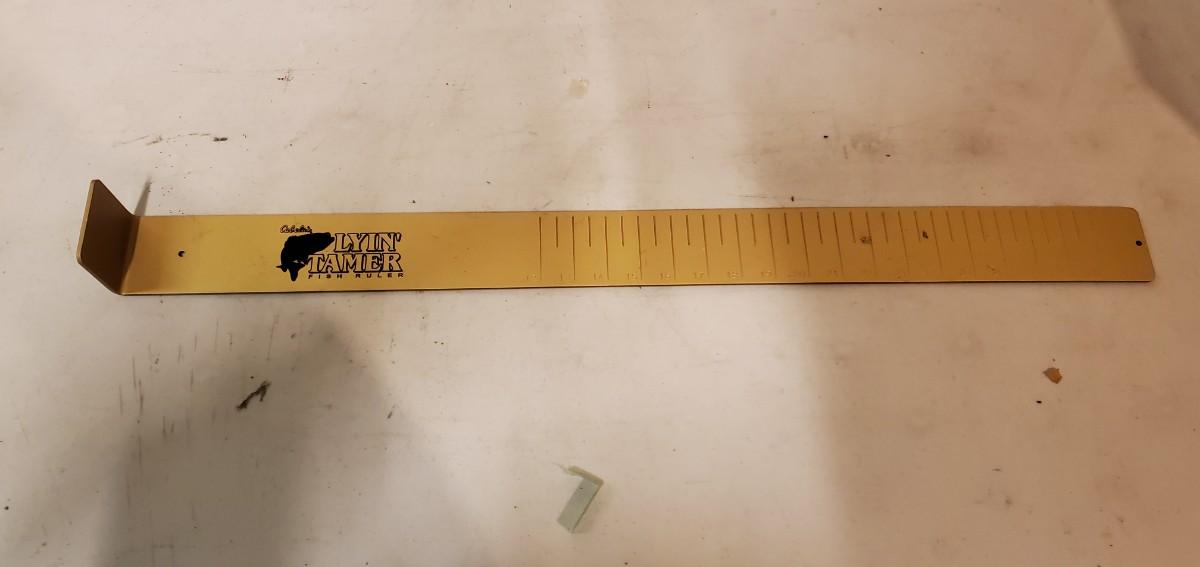 Metal fish ruler | EstateSales.org