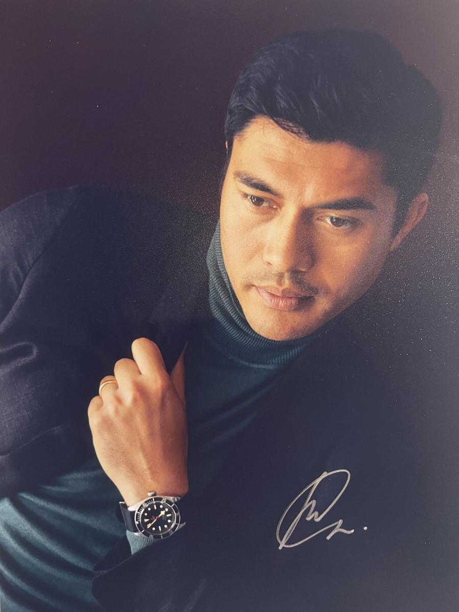 Henry Golding signed photo | EstateSales.org