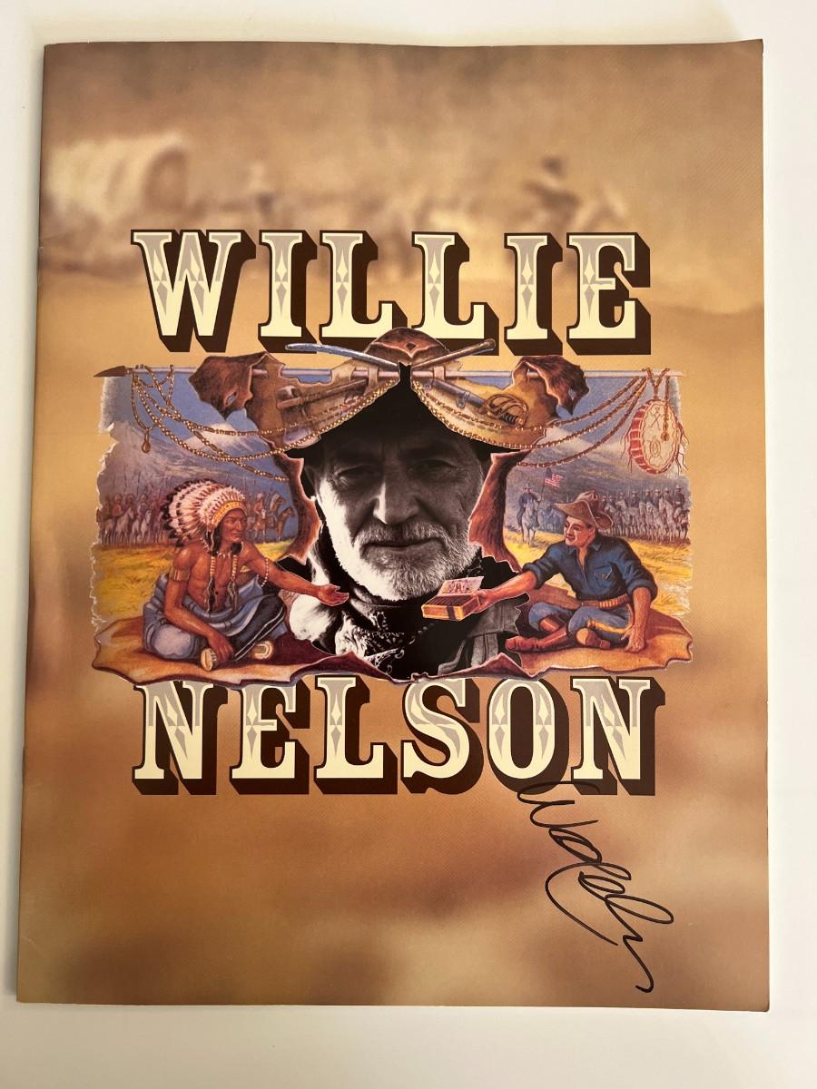 Willie Nelson signed booklet | EstateSales.org