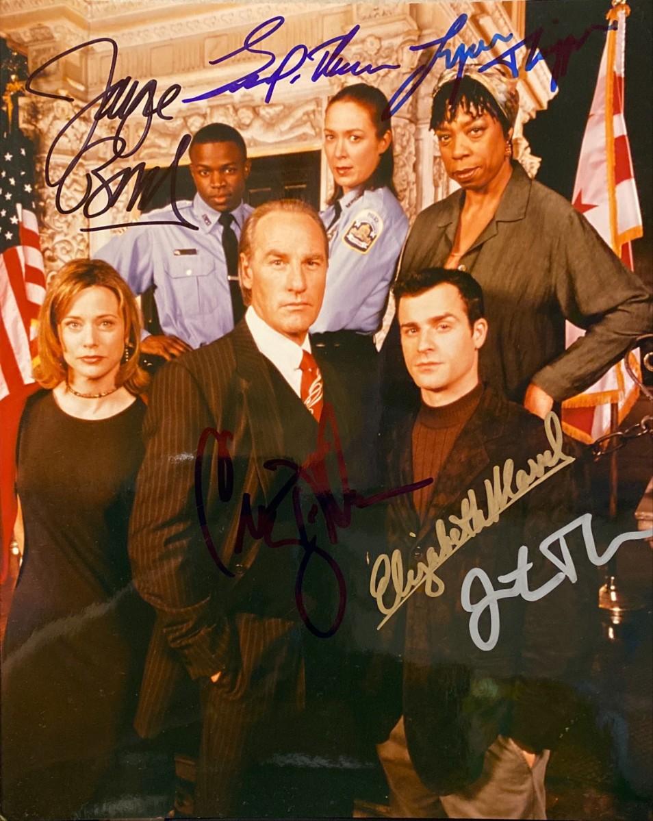 The District cast signed photo | EstateSales.org