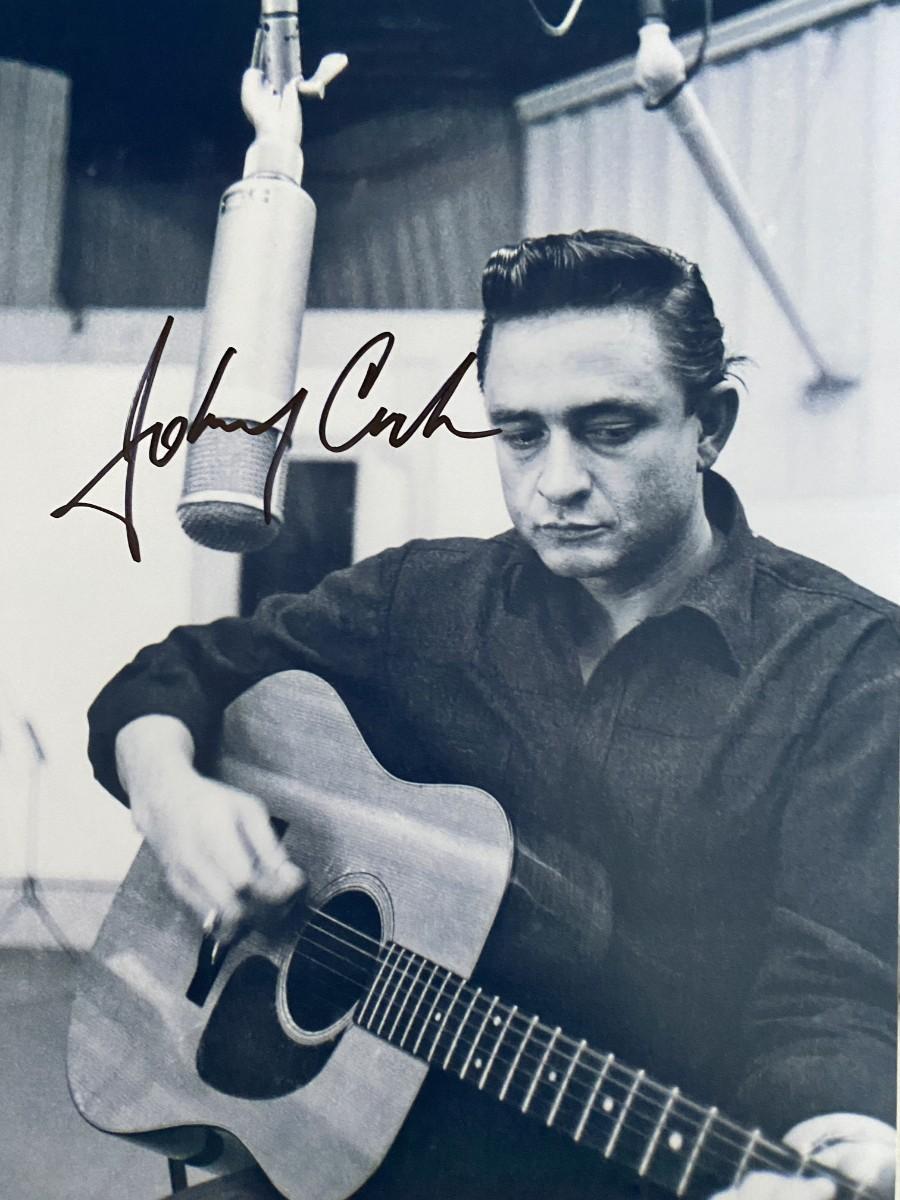 Johnny Cash signed photo | EstateSales.org