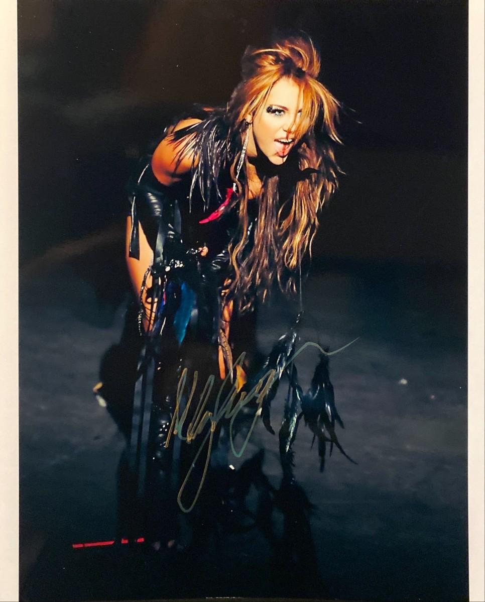 Miley Cyrus signed photo | EstateSales.org