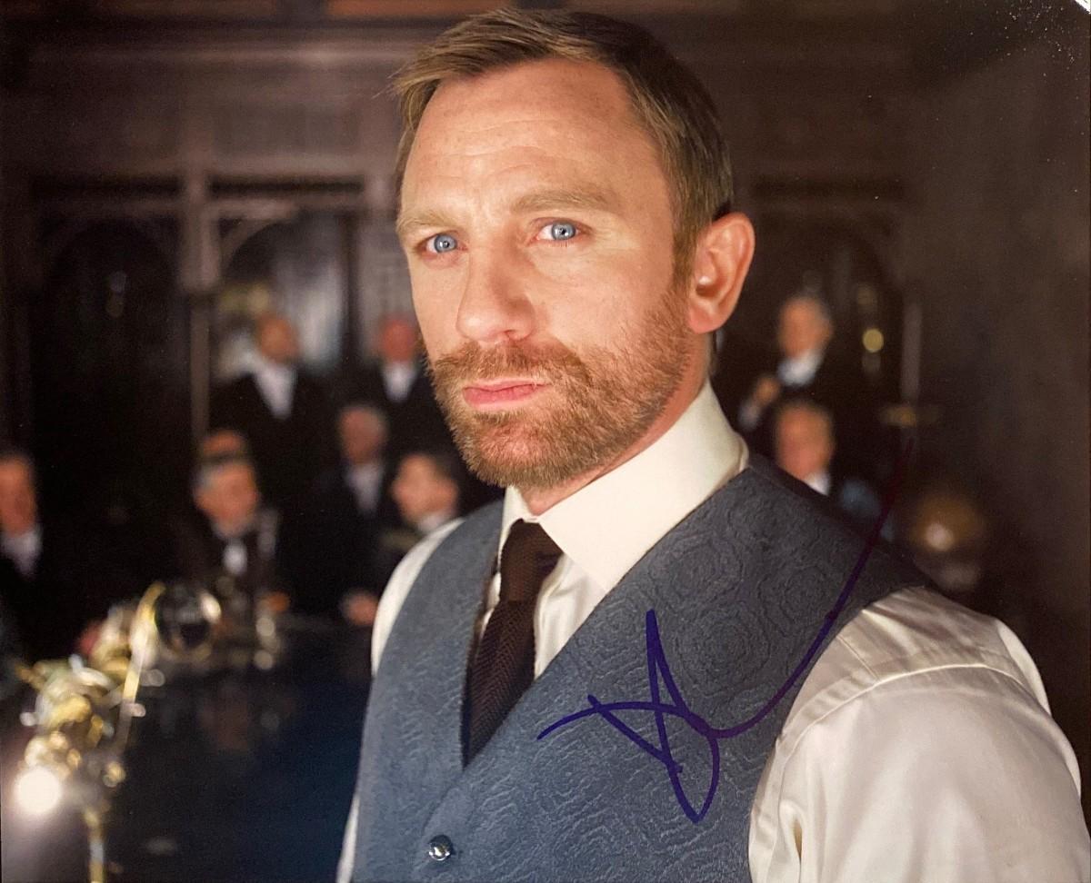 Daniel Craig signed "The Golden Compass" photo | EstateSales.org