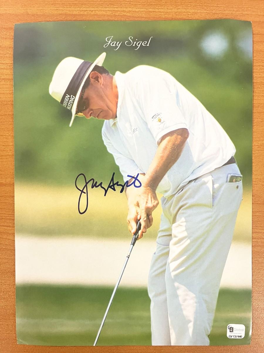 Professional golfer Jay Sigel signed magazine page | EstateSales.org