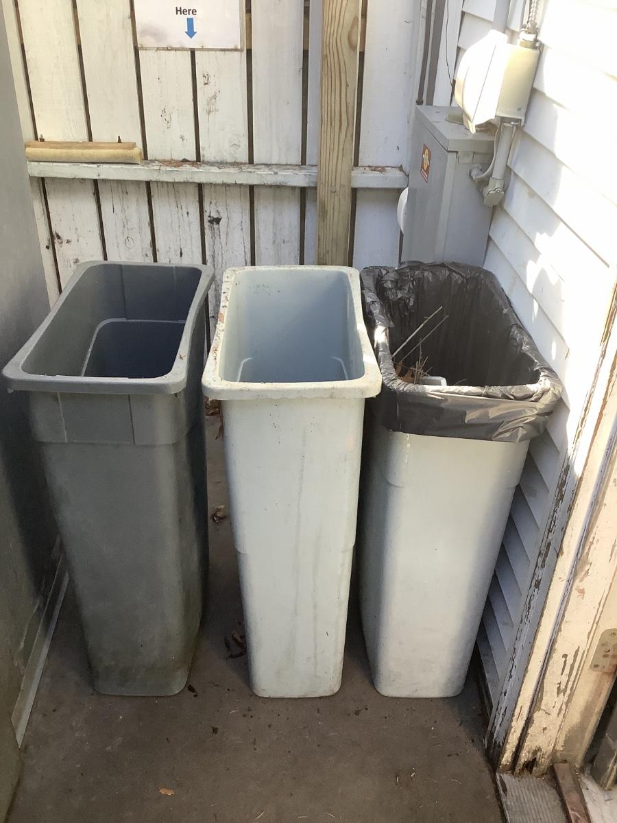 582 Three Used Slim Garbage Cans | EstateSales.org
