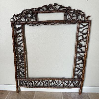 ANTIQUE TWIG FIREPLACE SCREEN AND A DRIED FOLIAGE WREATHE | EstateSales.org