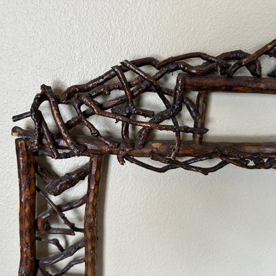 ANTIQUE TWIG FIREPLACE SCREEN AND A DRIED FOLIAGE WREATHE | EstateSales.org