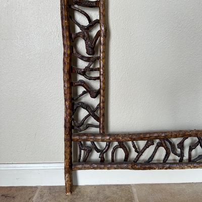 ANTIQUE TWIG FIREPLACE SCREEN AND A DRIED FOLIAGE WREATHE | EstateSales.org