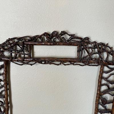 ANTIQUE TWIG FIREPLACE SCREEN AND A DRIED FOLIAGE WREATHE | EstateSales.org