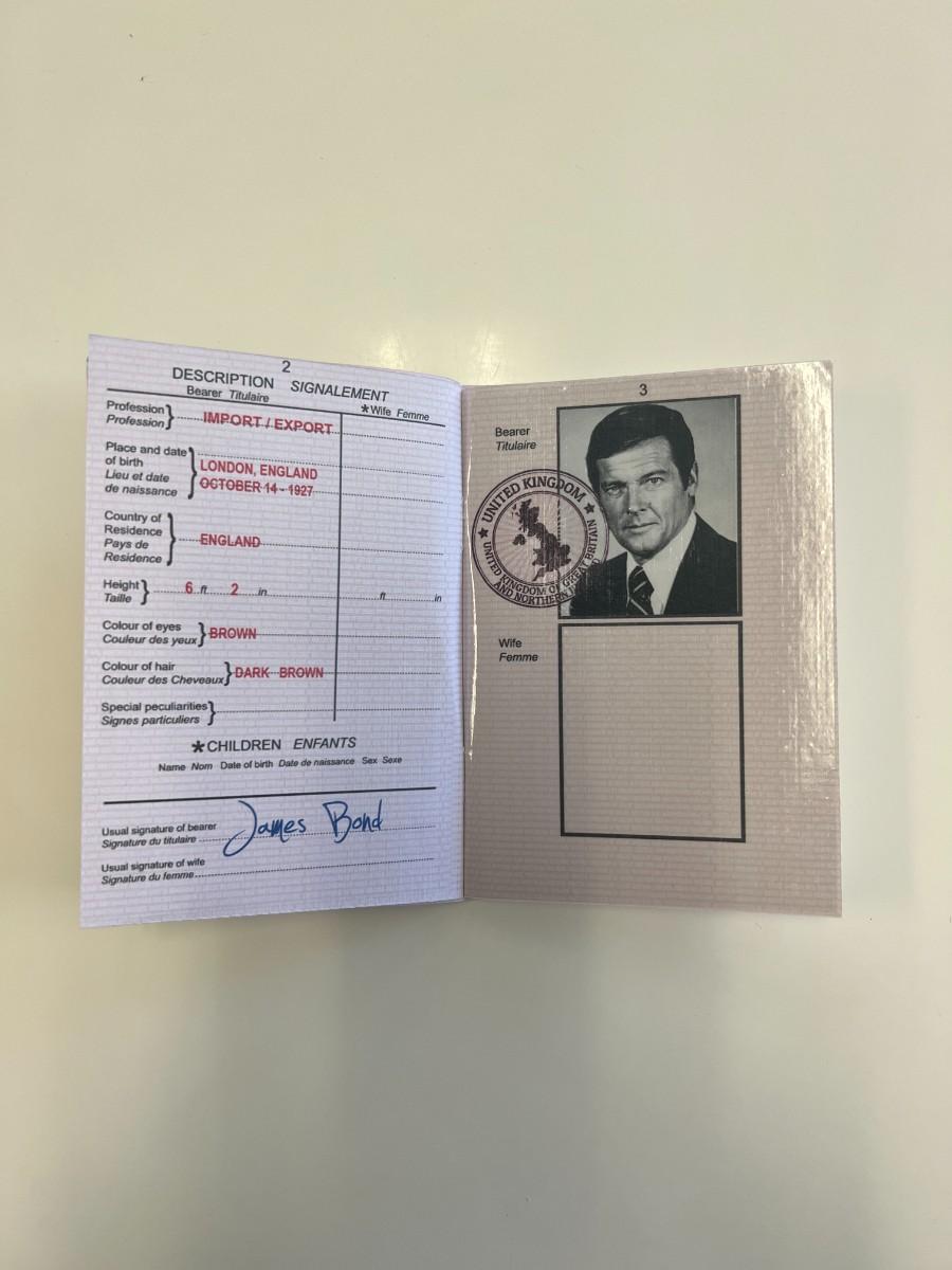James Bond Roger Moore film passport prop | EstateSales.org